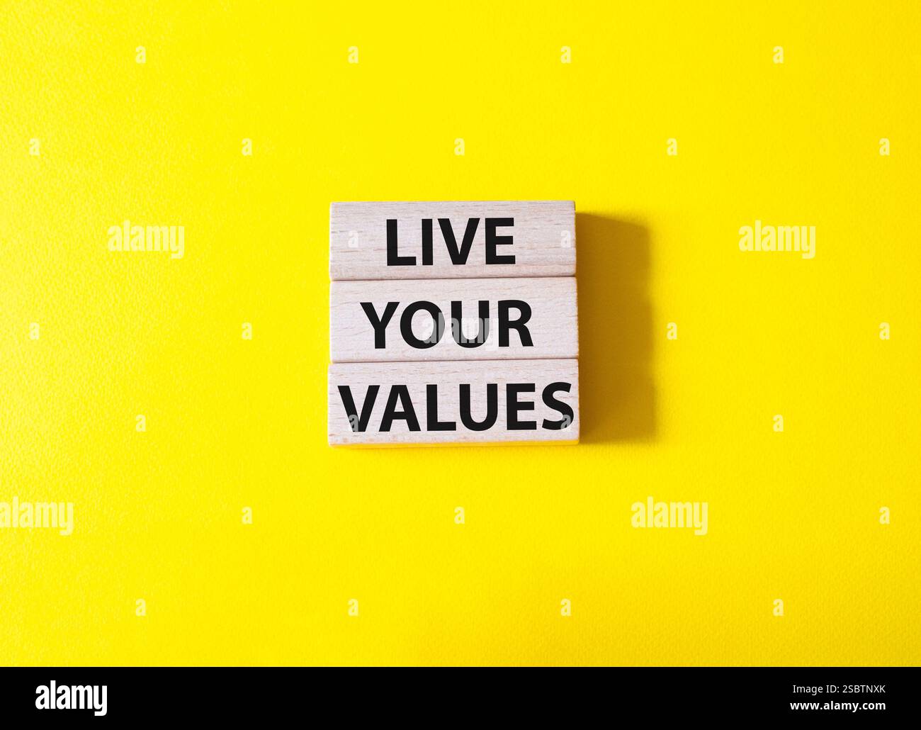 Live your values symbol. Concept words Live your values on wooden ...