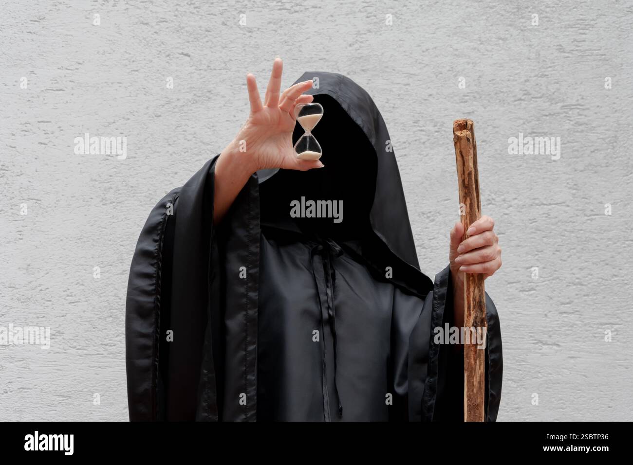 The personification of fate - a mysterious character with a clock in ...