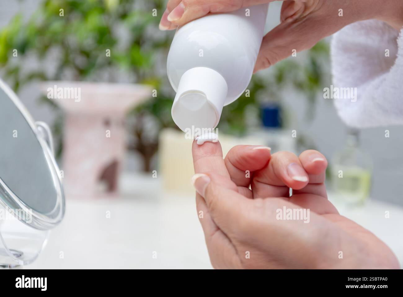Skincare after shower , cream on your fingertip Stock Photo - Alamy