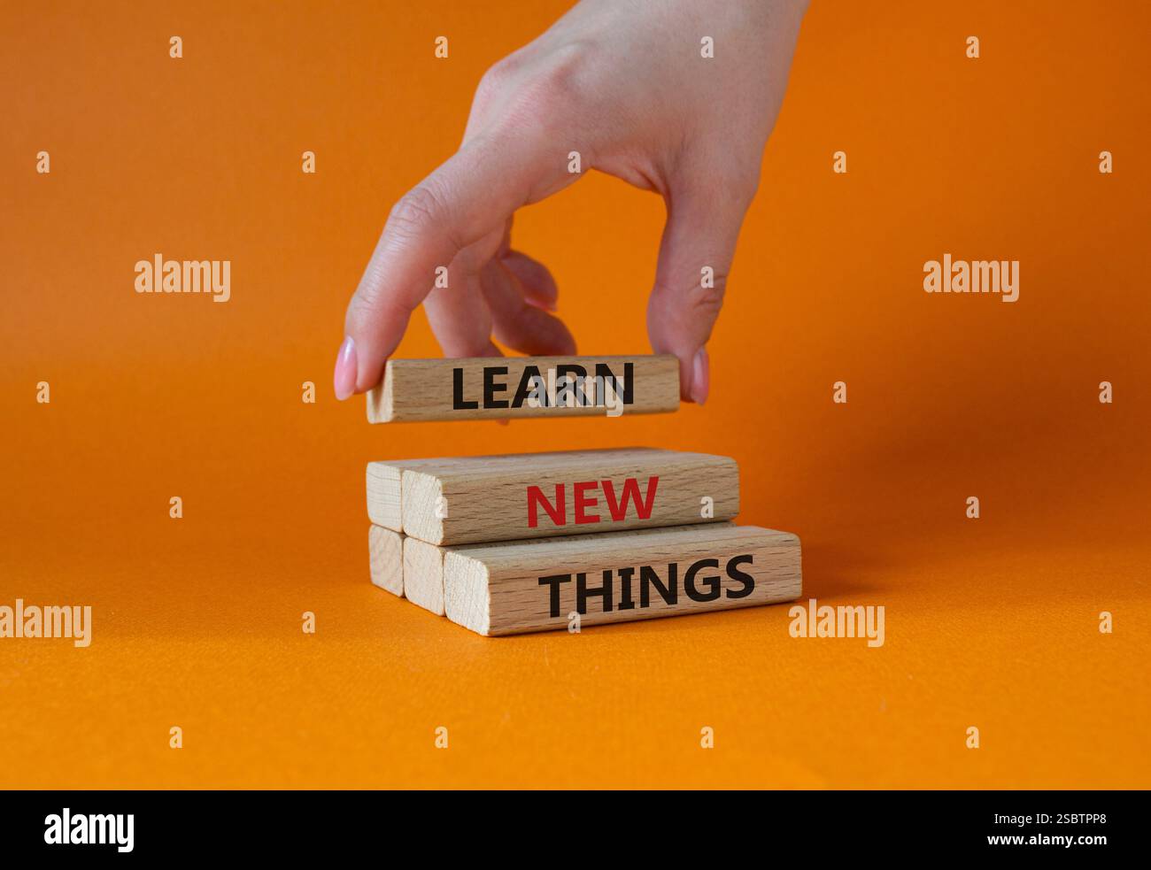 Learn new things symbol. Concept words Learn new things on wooden ...