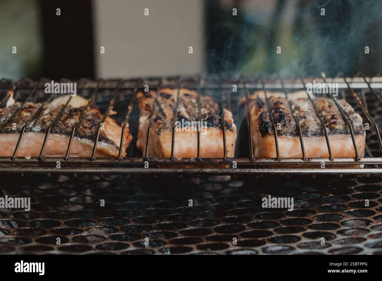 Grilled Salmon Fillets on Barbecue Rack Stock Photo - Alamy