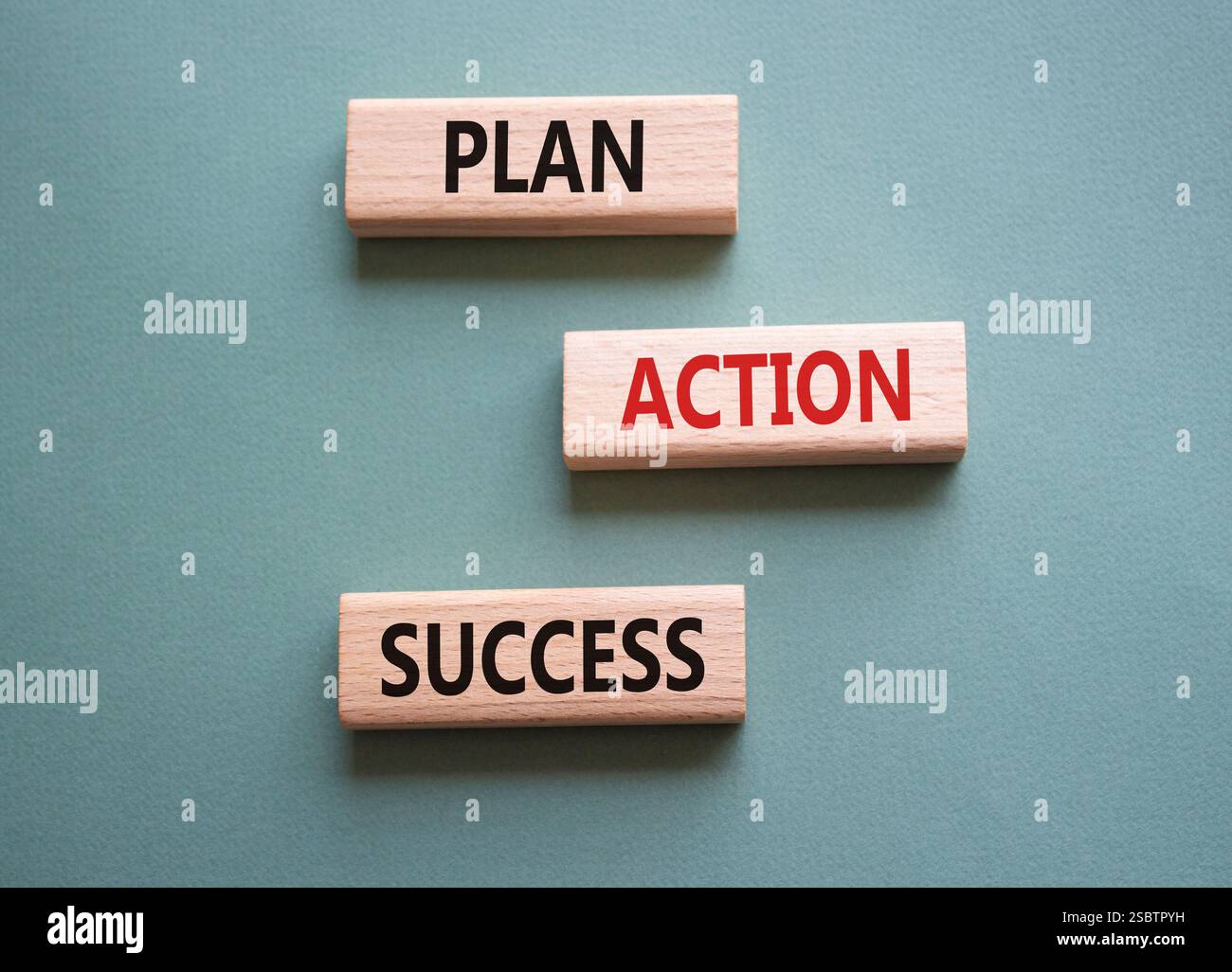 Plan Action Success symbol. Concept word Plan Action Success on wooden blocks. Beautiful grey ...