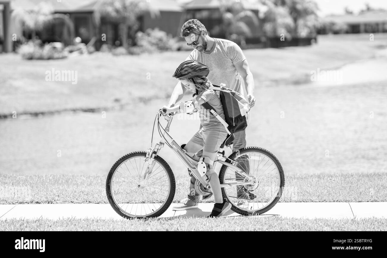 dad guiding his son first bike ride. Deepening family connection. dad ...
