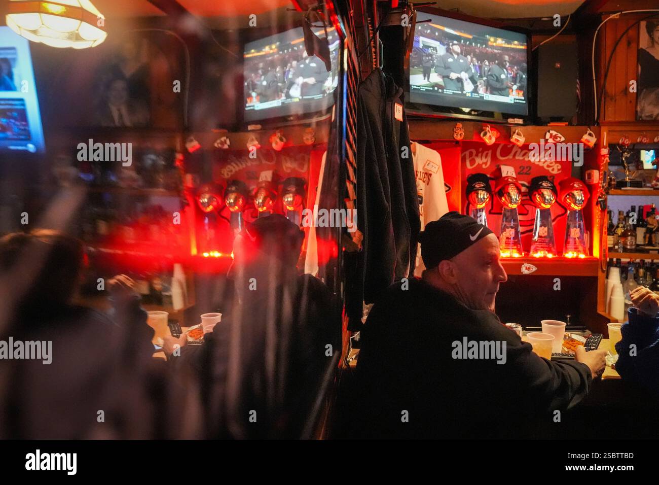 Big Charlie's Saloon Owner Paul Staico sits with customers at his bar ...