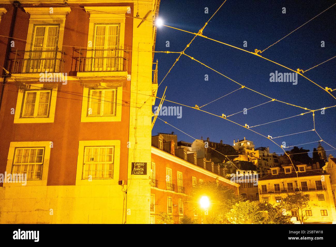Building at night of the Alfama district in Lisbon capital of Portugal ...