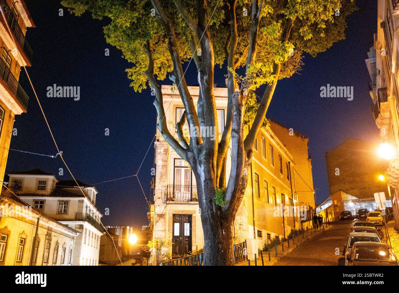 Building at night of the Alfama district in Lisbon capital of Portugal ...