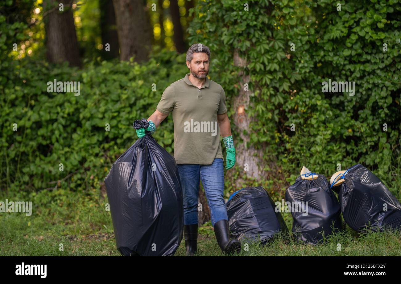 Environmental conservation. Save environment. Environment plastic pollution. Volunteer man ...