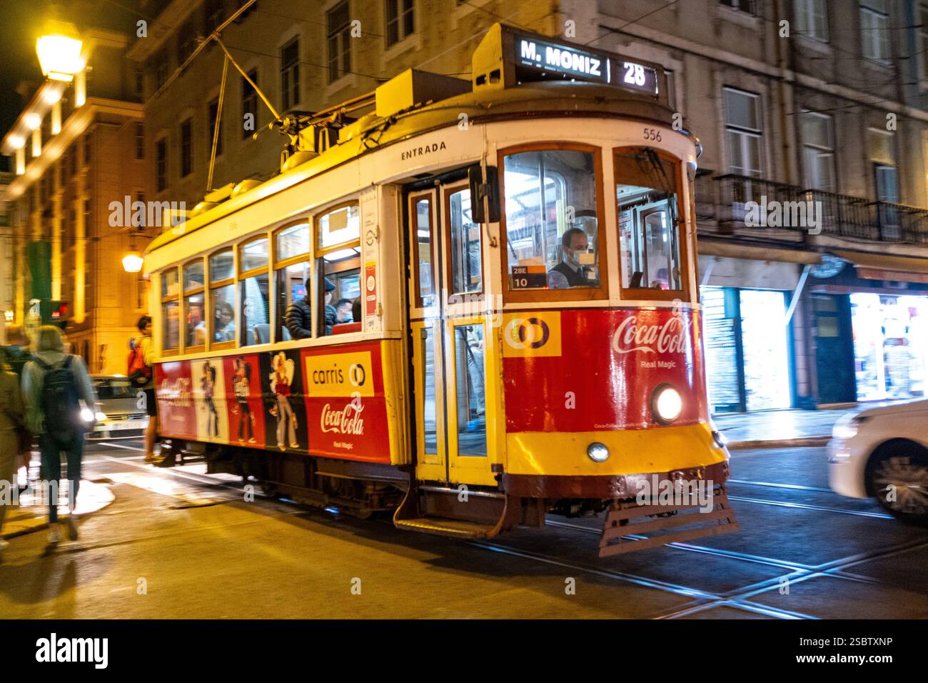 Traditional tramway in the Alfama district in Lisbon capital of ...