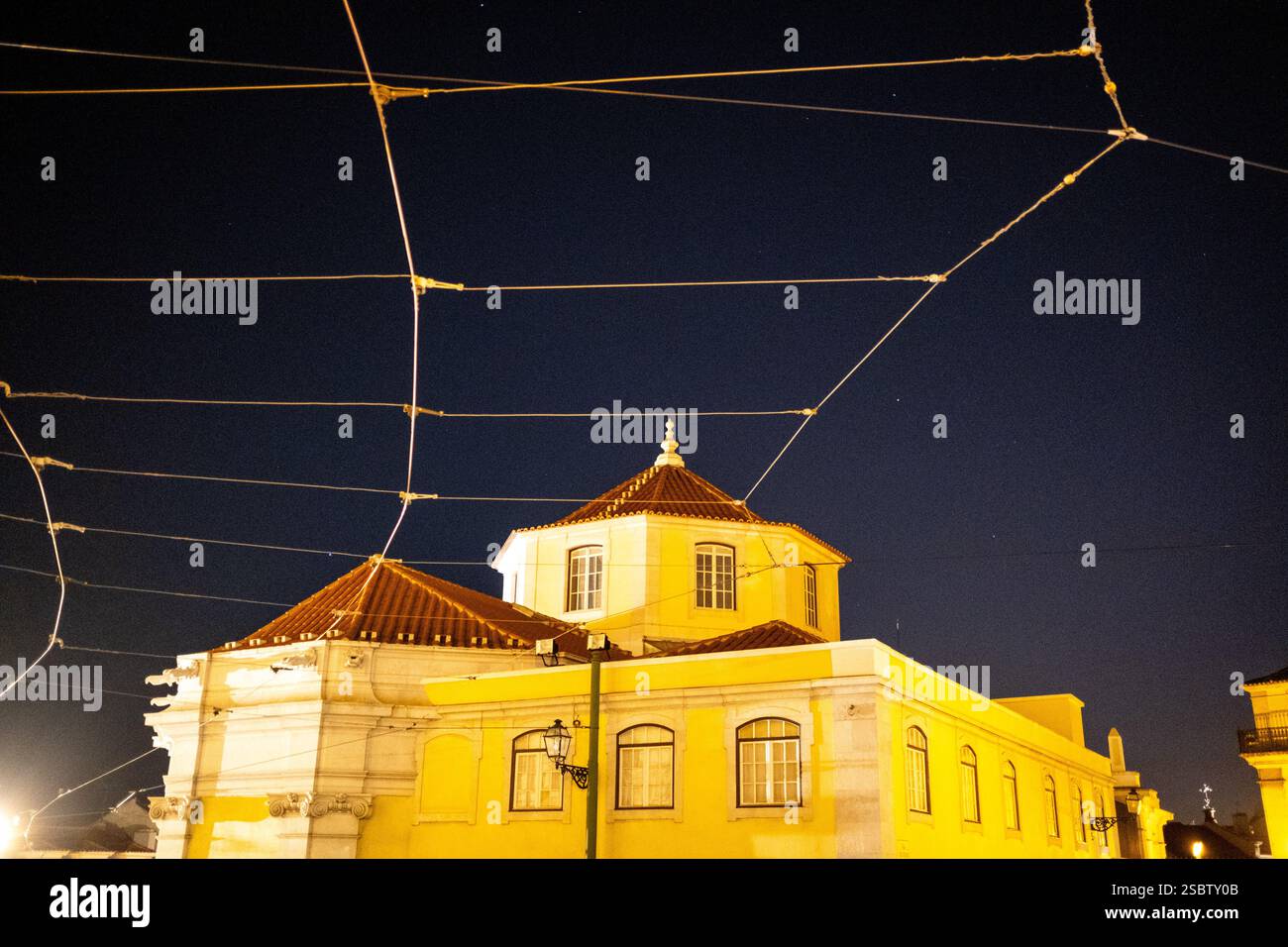 Building at night of the Alfama district in Lisbon capital of Portugal ...