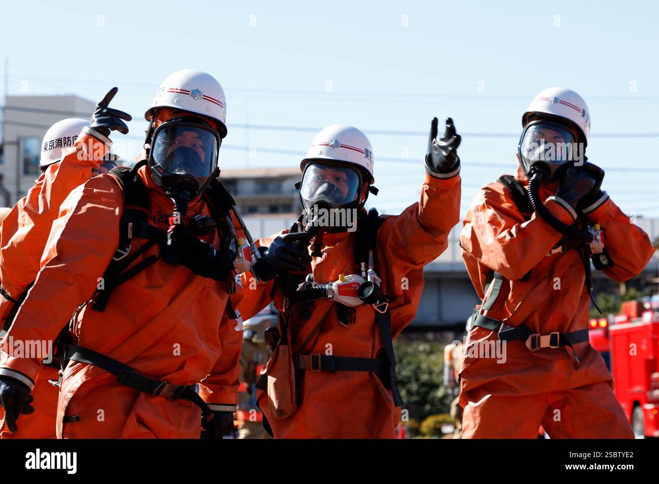 Tokyo, Japan. 4th Feb, 2025. Firefighters wearing protective gears take part in a prevention ...