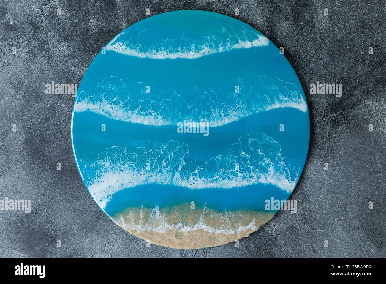 Resin art plate with blue colors like a ocean. Epoxy effect background ...