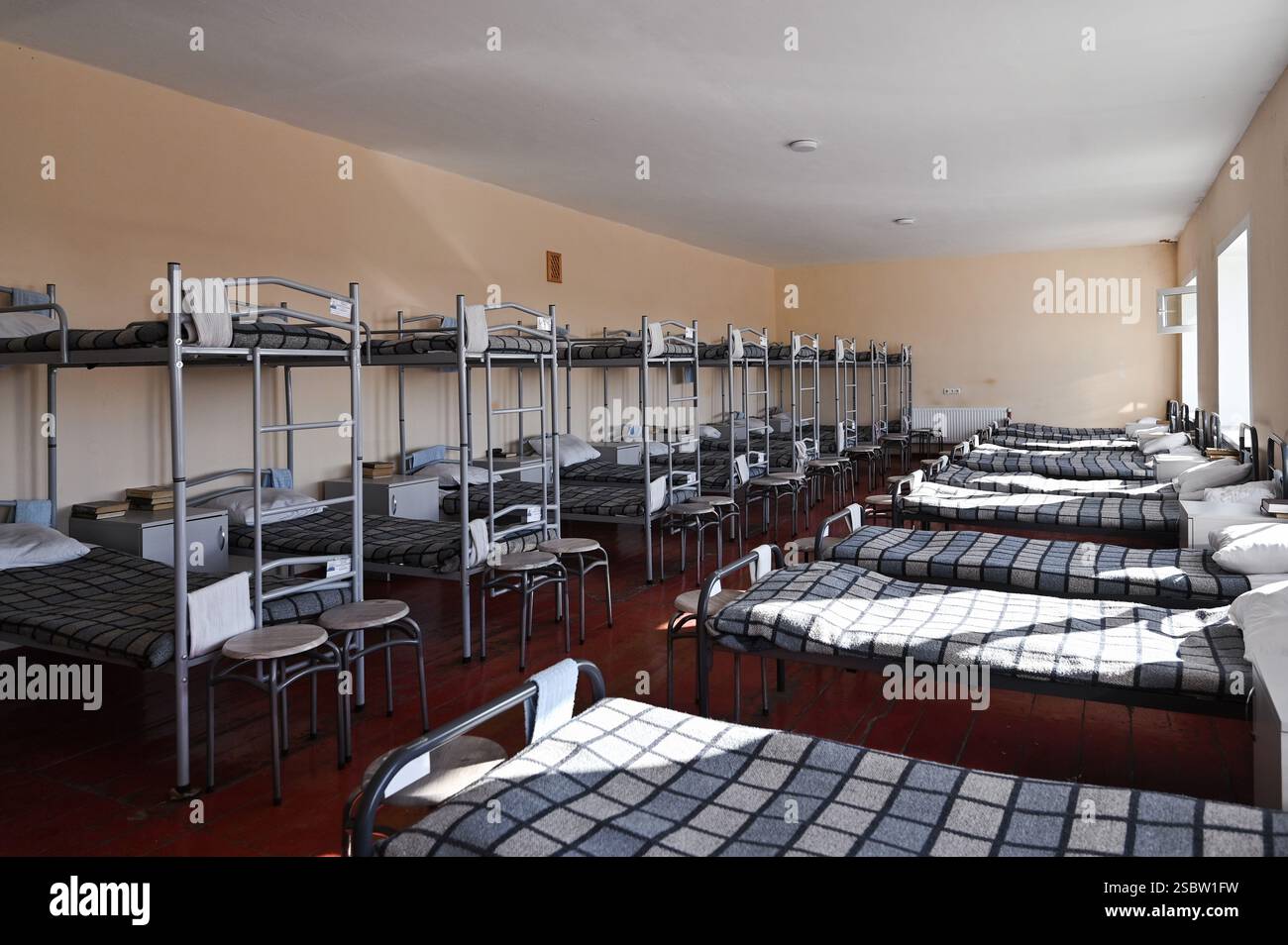 UKRAINE - JANUARY 30, 2025 - Bunk beds and single-tier beds are seen in ...