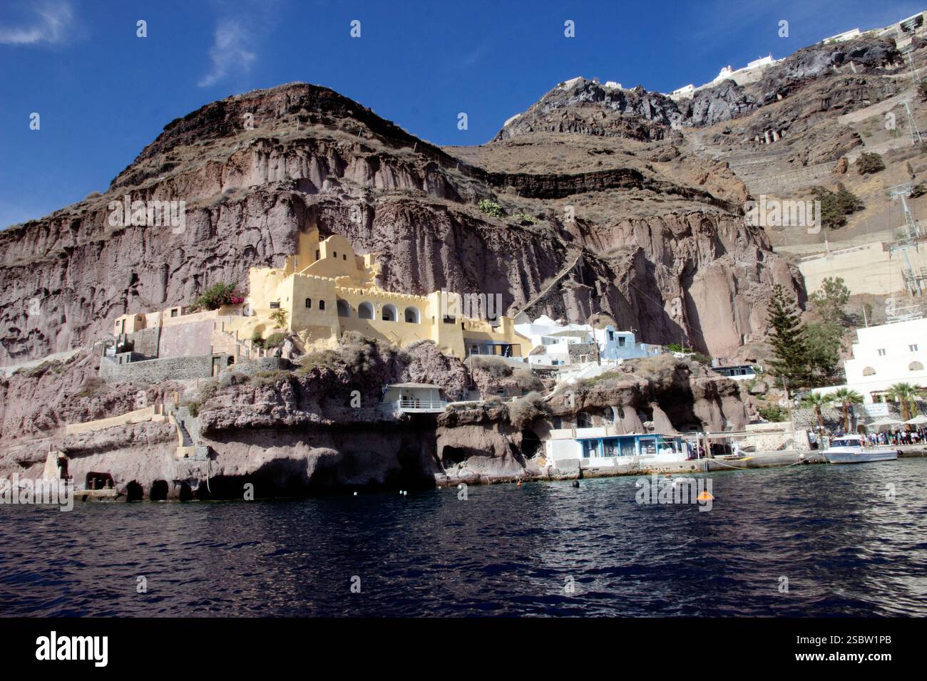 Greek island Santorini, where iconic whitewashed houses and blue-domed ...