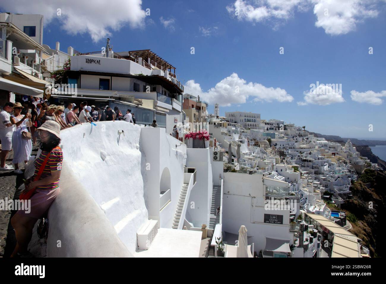 Fira, popular tourist destination on Santorini, has iconic white houses ...