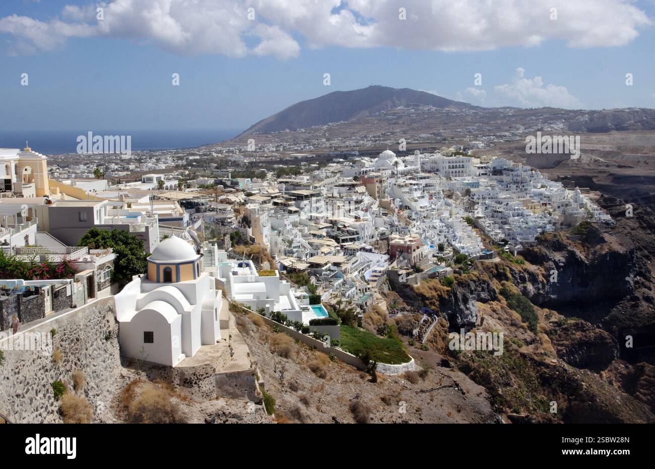Fira, popular tourist destination on Santorini, has iconic white houses ...