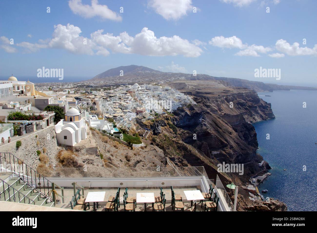 Fira, popular tourist destination on Santorini, has iconic white houses ...