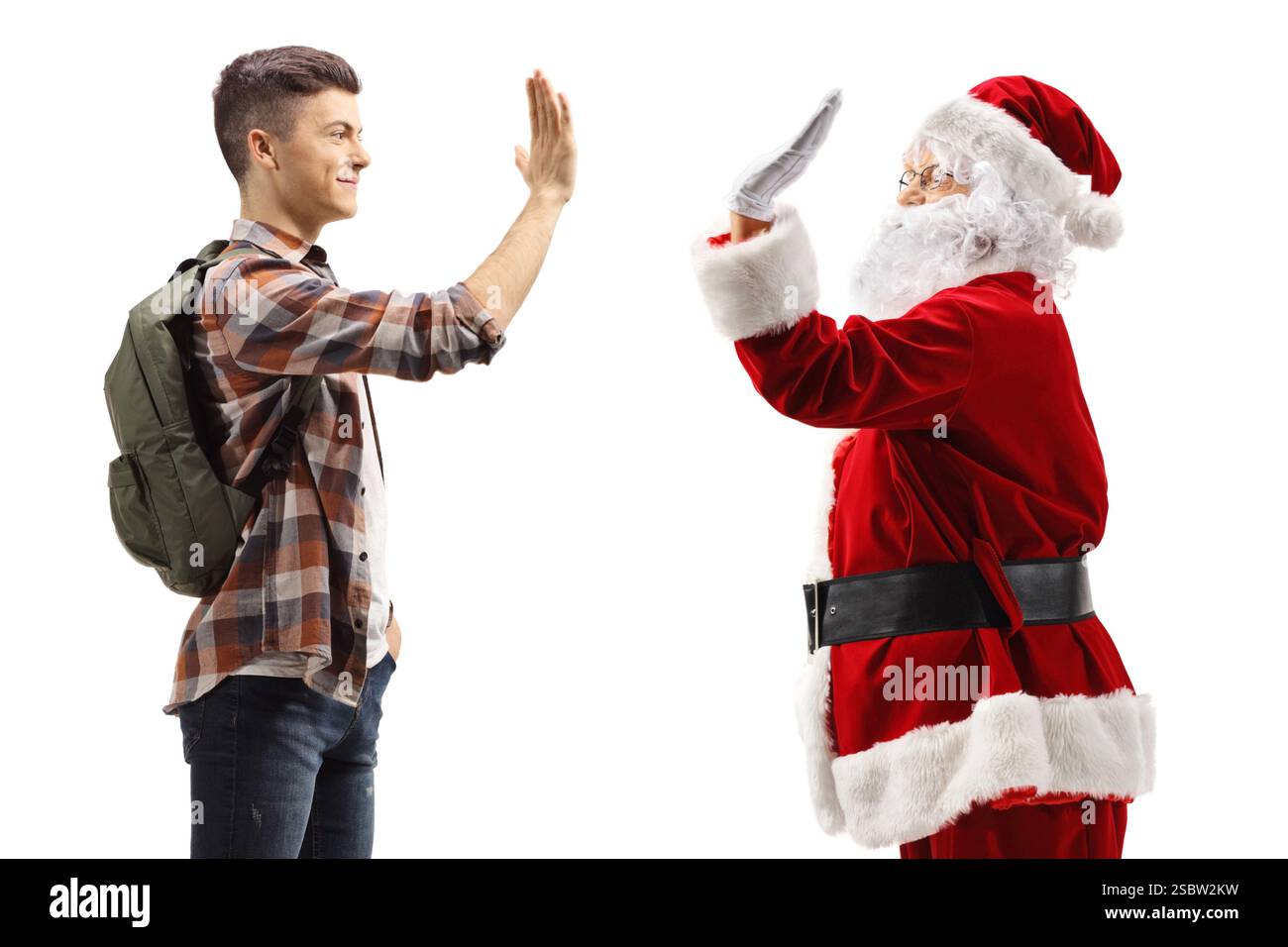 Male student making high-five gesture with Santa Claus isolated on ...