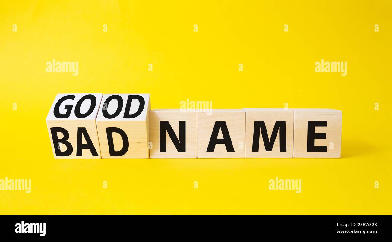 Good name and bad name symbol. Turned wooden cubes with words Bad name ...