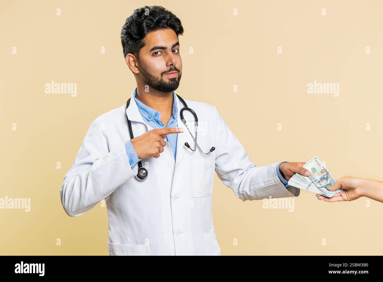 Indian speaker doctor cardiologist man receiving bribe from patient ...