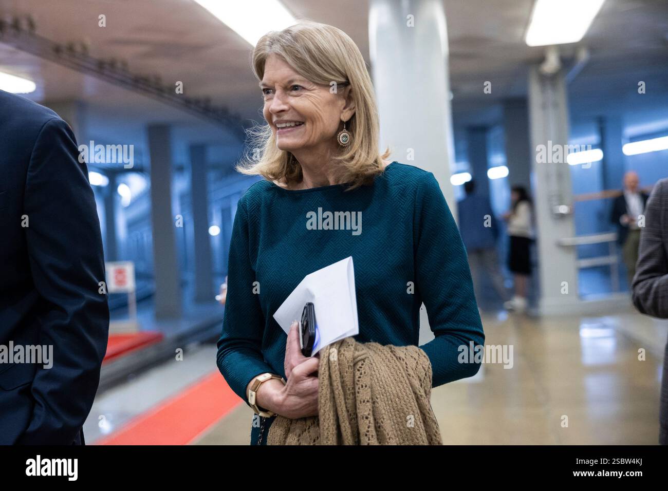 Sen. Lisa Murkowski (R-Alaska) walks to a vote at the U.S. Capitol Feb ...