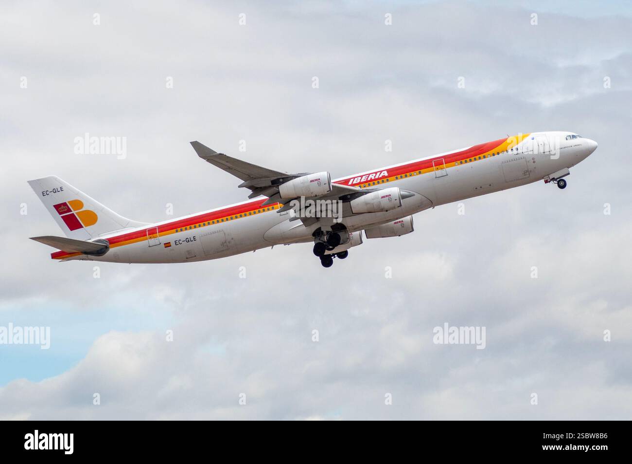 Four-engine aircraft. Iberia Airbus A340 airliner taking off at Madrid ...