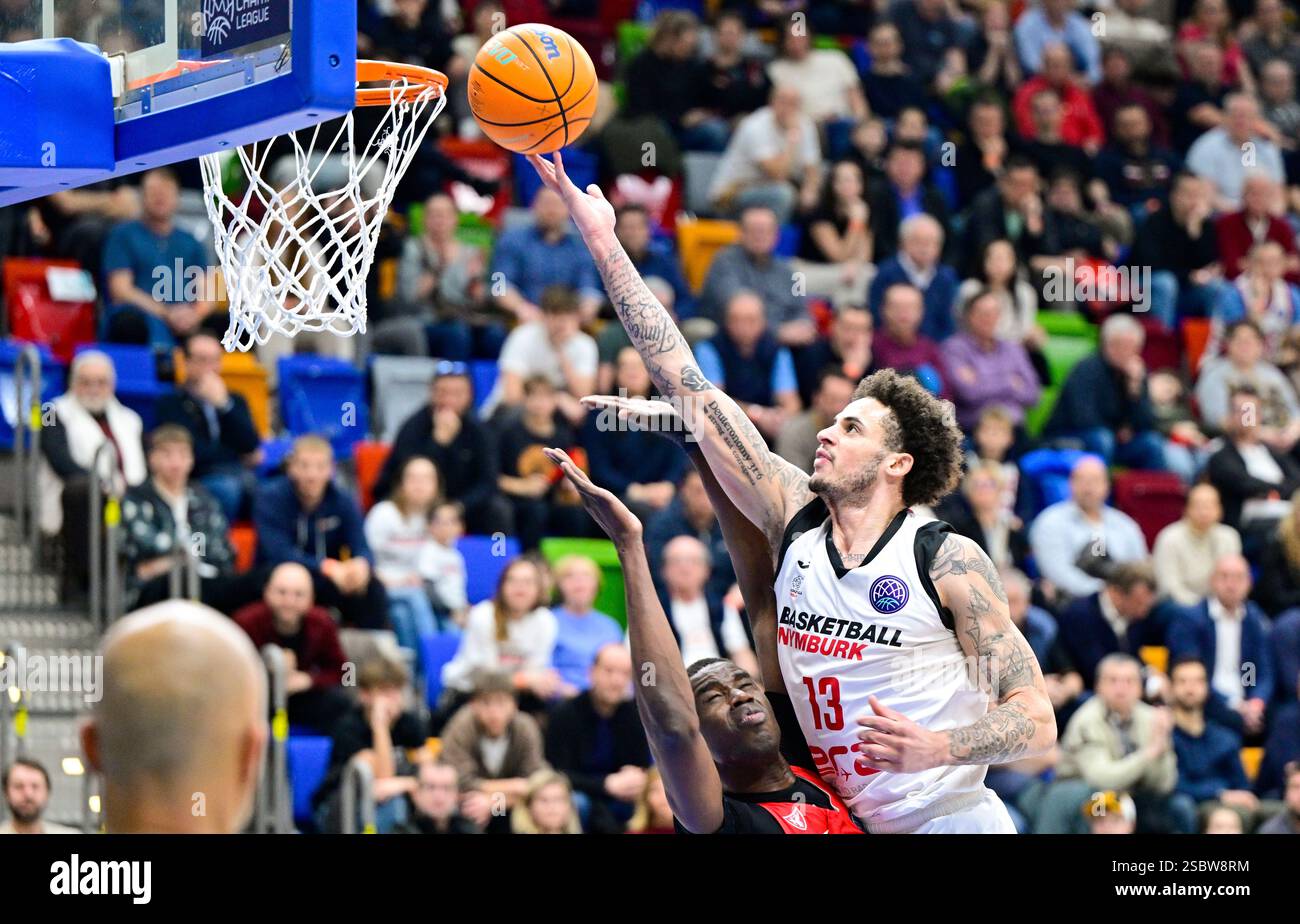 Prague, Czech Republic. 04th Feb, 2025. From left Moussa Diagne of Murcia and Christian Bishop ...