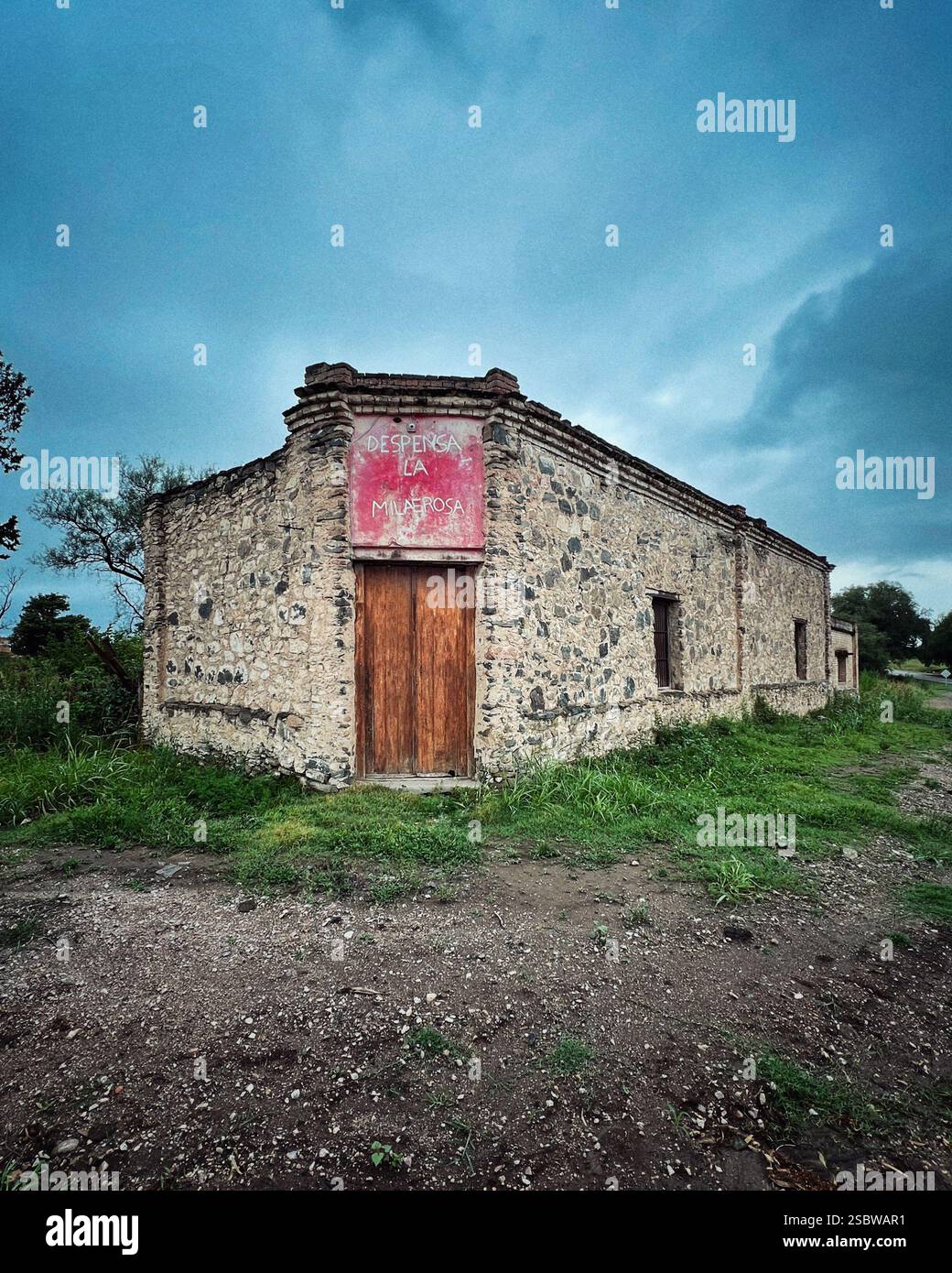 Abandoned stone building. Old abandoned warehouse Stock Photo - Alamy