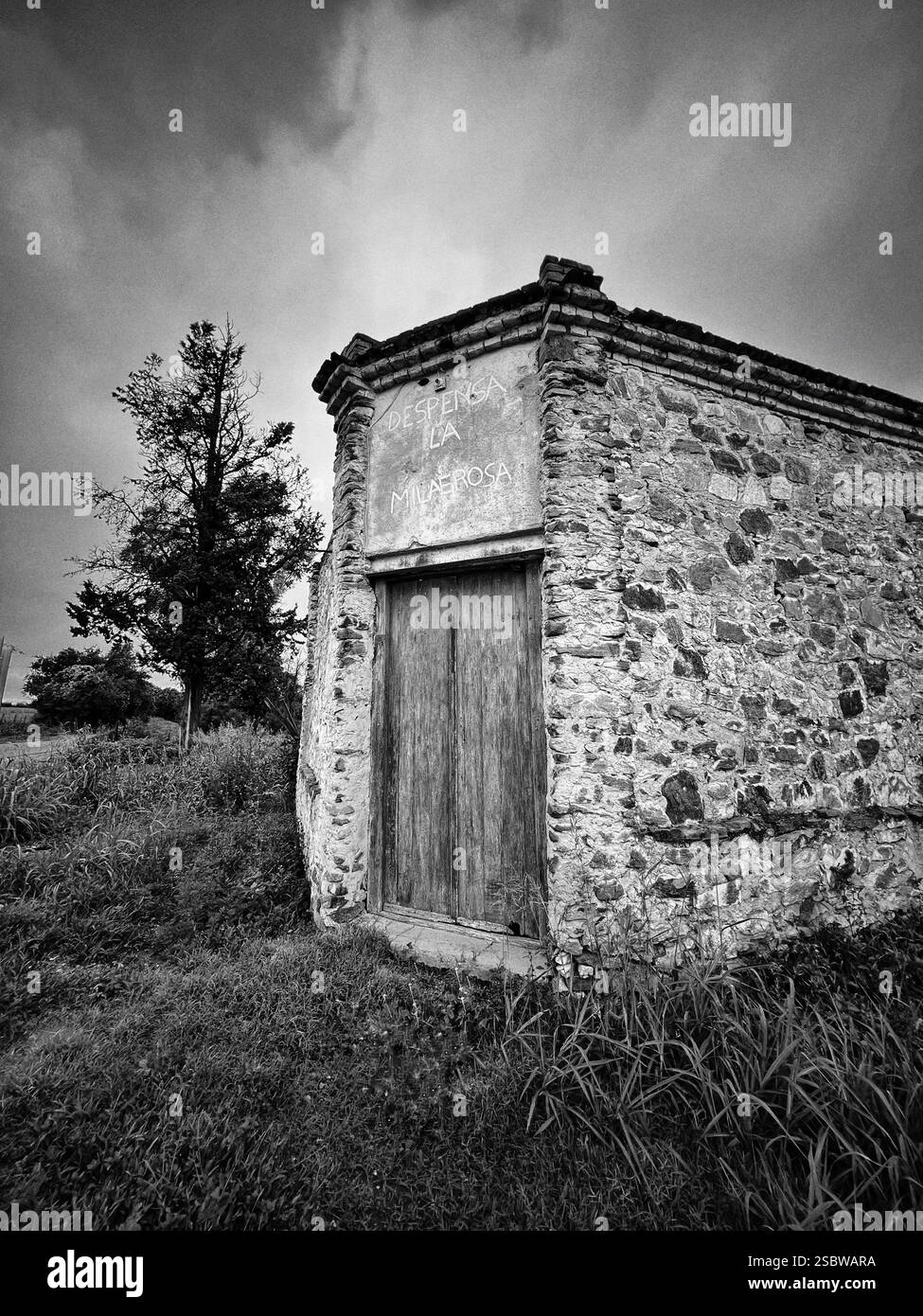 Abandoned stone building. Old abandoned warehouse Stock Photo - Alamy