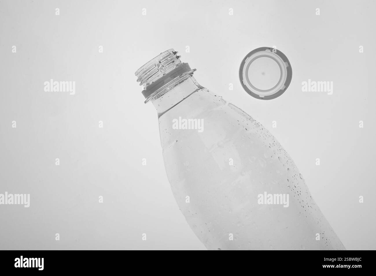 Empty plastic bottle on white background, top view Stock Photo - Alamy