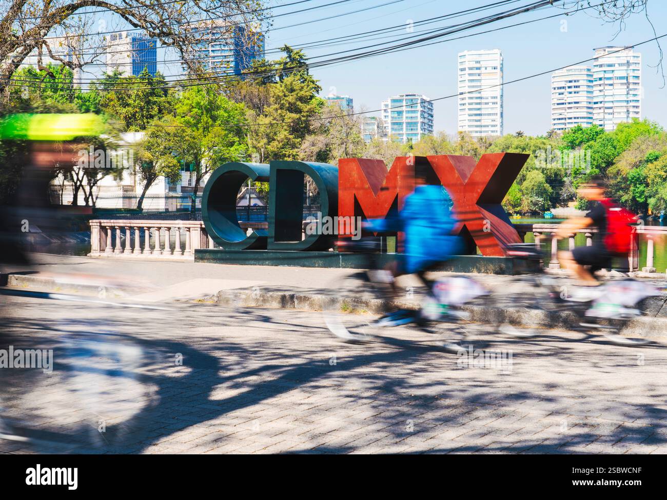 This photo captures a vibrant street scene in Mexico City featuring the ...