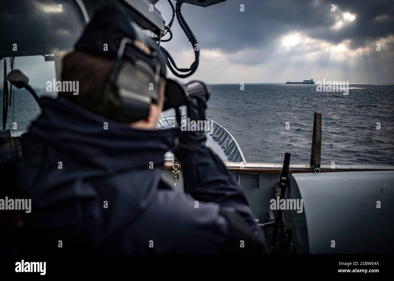 KARLSKRONA 2025-02-04 A cargo ship on the horizon is viewed through the ...