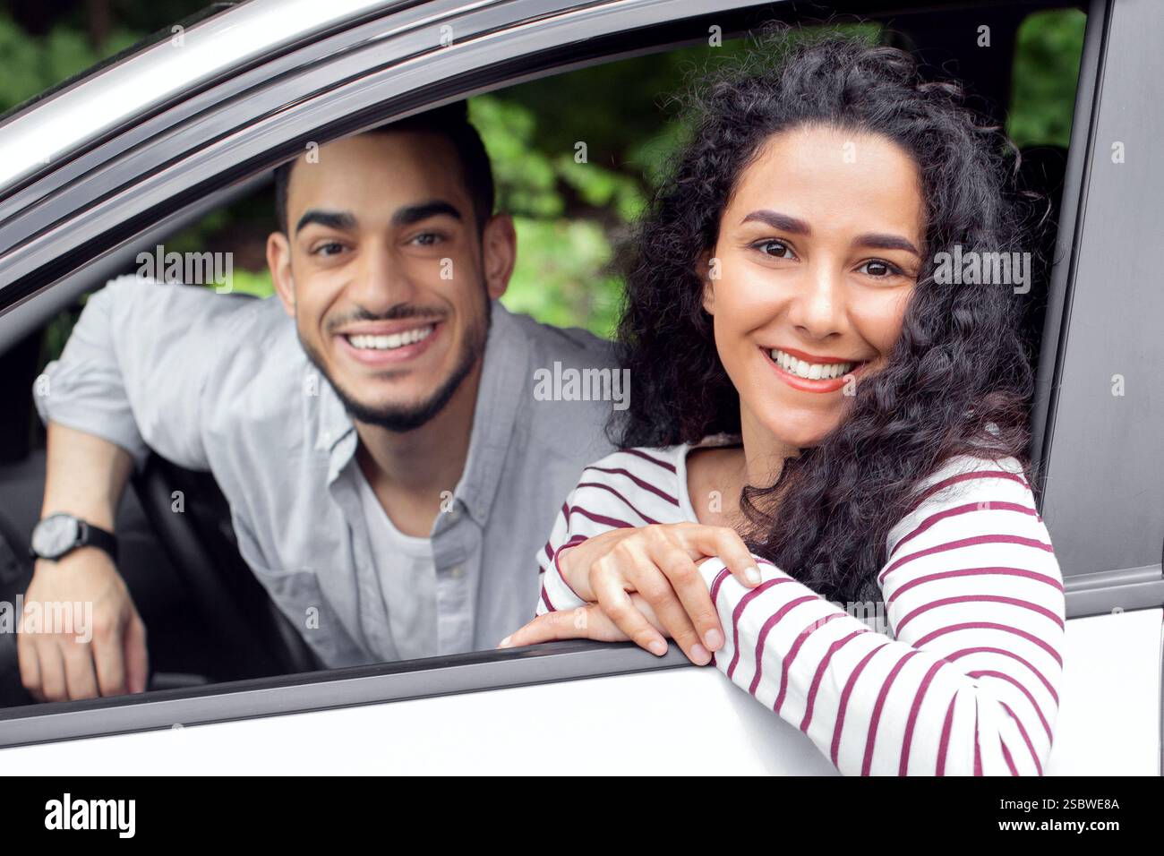Happy Family Ride. Cheerful Arab Parents And Little Son Sitting In Car ...