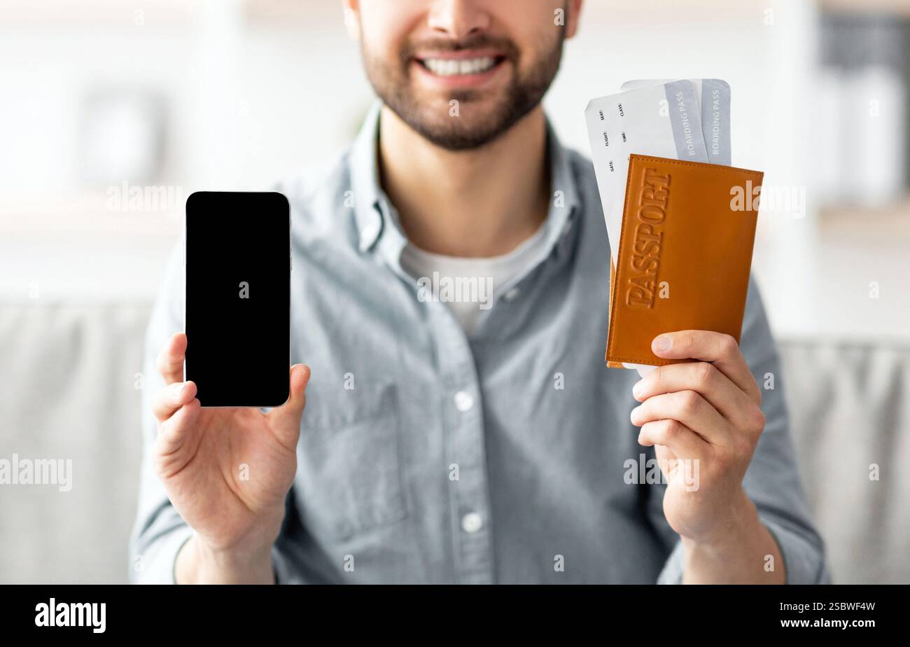 Online tour ot hotel booking app. Young guy with passport and tickets ...