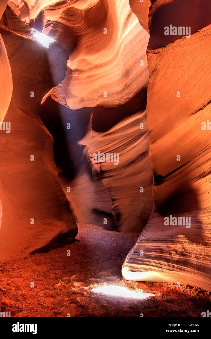 A cave with a light shining through it. The light is coming from the ...