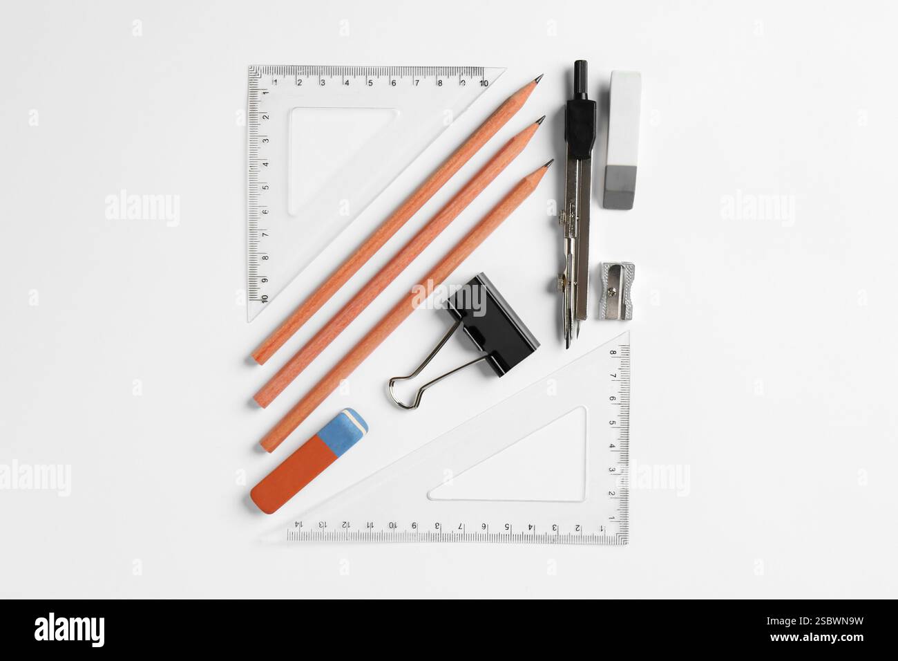 Flat lay composition with ruler and other stationery on white ...