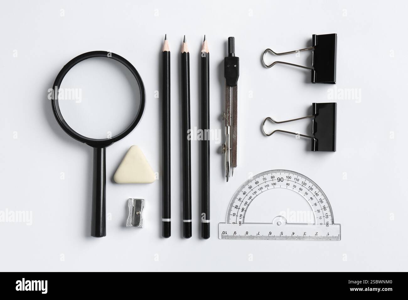 Flat lay composition with ruler and other stationery on white ...