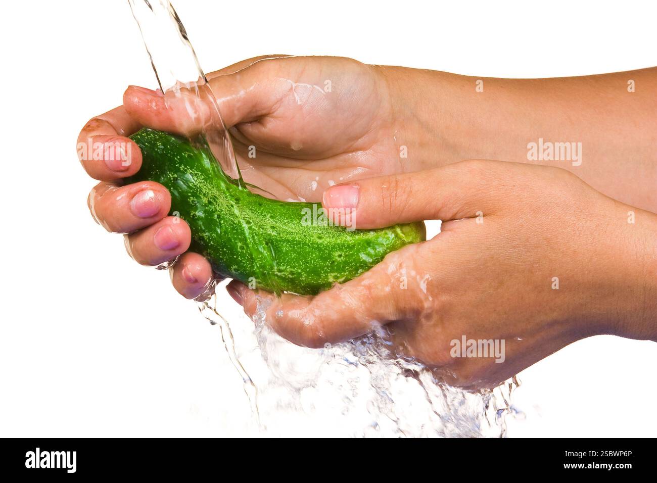 wash the cucumber in the hands isolated on white background Stock Photo ...