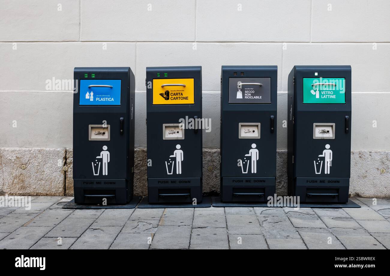 Four smart garbage bins for plastic, paper, non-recyclable waste, glass ...