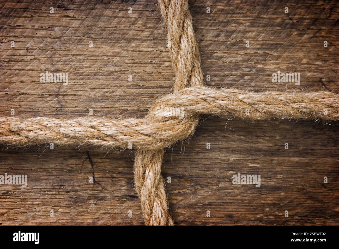 Rope with knots on the background of the old wooden boards Stock Photo ...