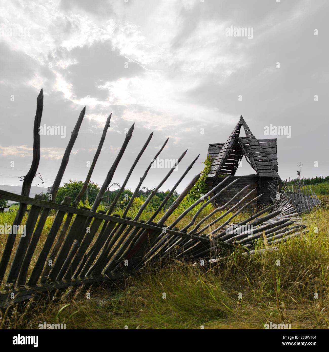 old country house with the fallen fence Stock Photo - Alamy