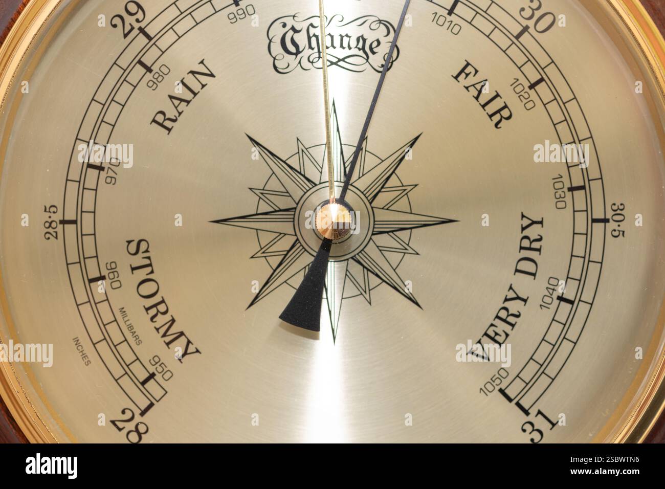 Close up of an aneroid barometer mounted on a wall Stock Photo - Alamy