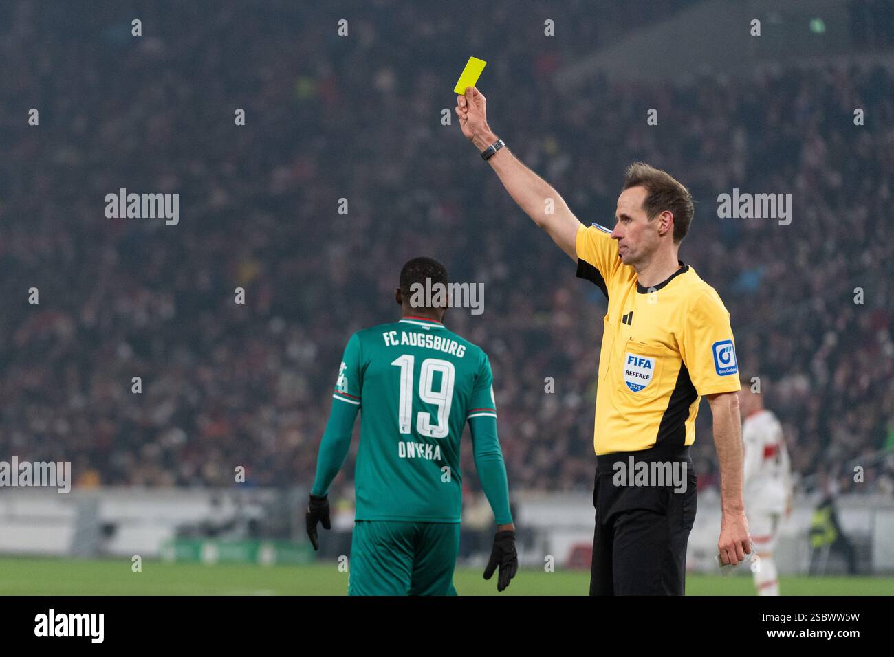 Schiedsrichter Sascha Stegemann zeigt Ermedin Demirovic (VfB Stuttgart, #09) die gelbe Karte GER ...