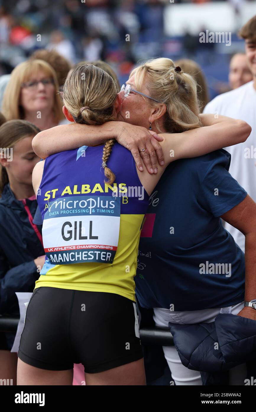 Phoebe GILL of St Albans AC signing autographs after winning an 800m ...