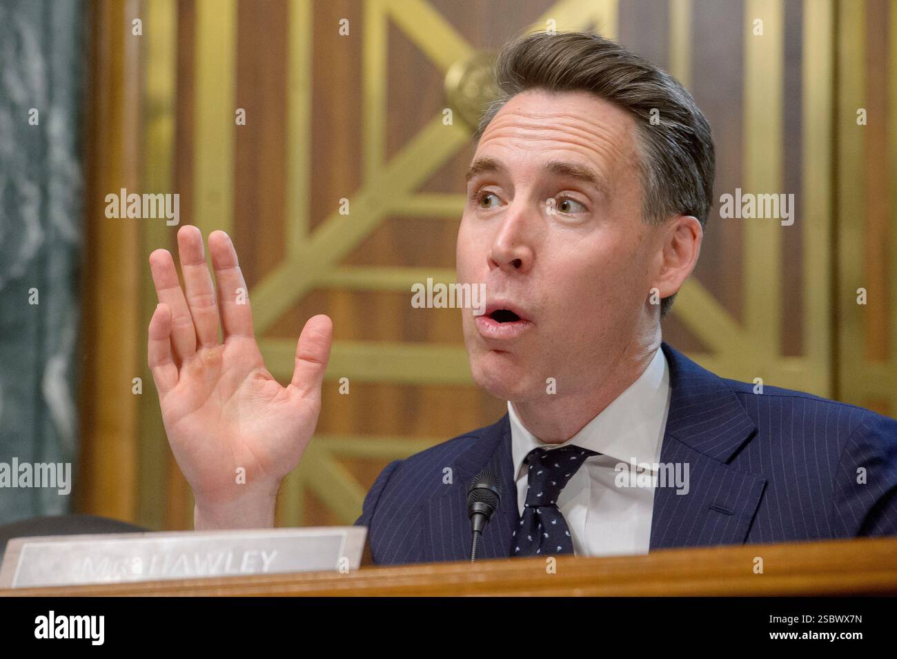 Sen. Josh Hawley, R-Mo., questions the witnesses during a Senate ...