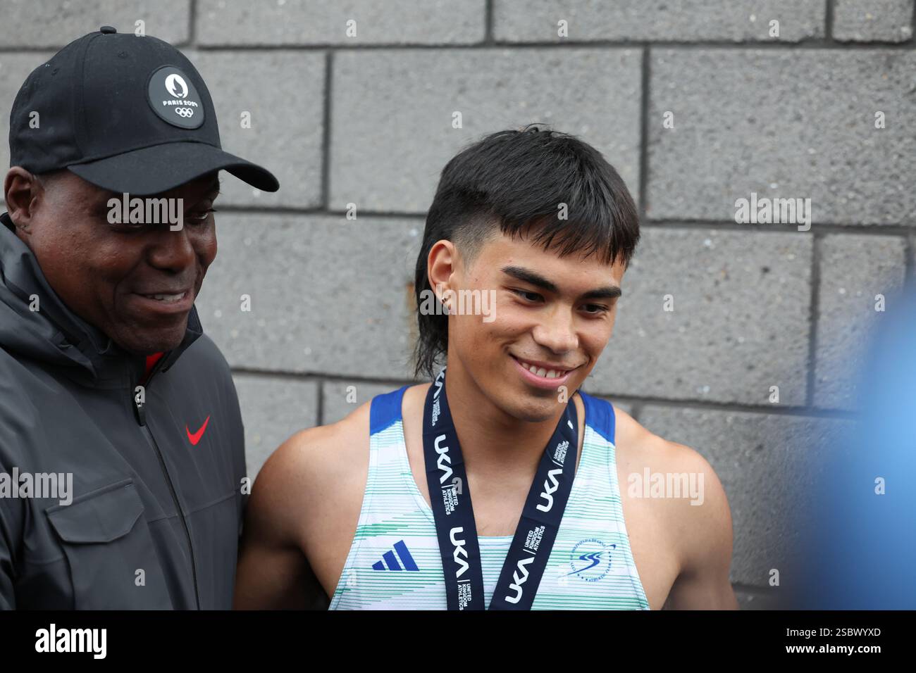 Louie HINCHLIFFE of City of Sheffield & Dearne AC with his coach Carl ...
