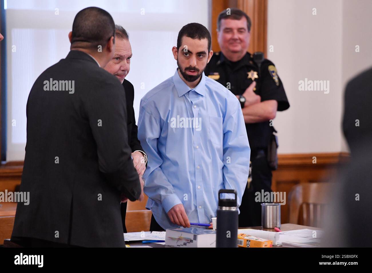 Hadi Matar, right, charged with severely injuring author Salman Rushdie ...