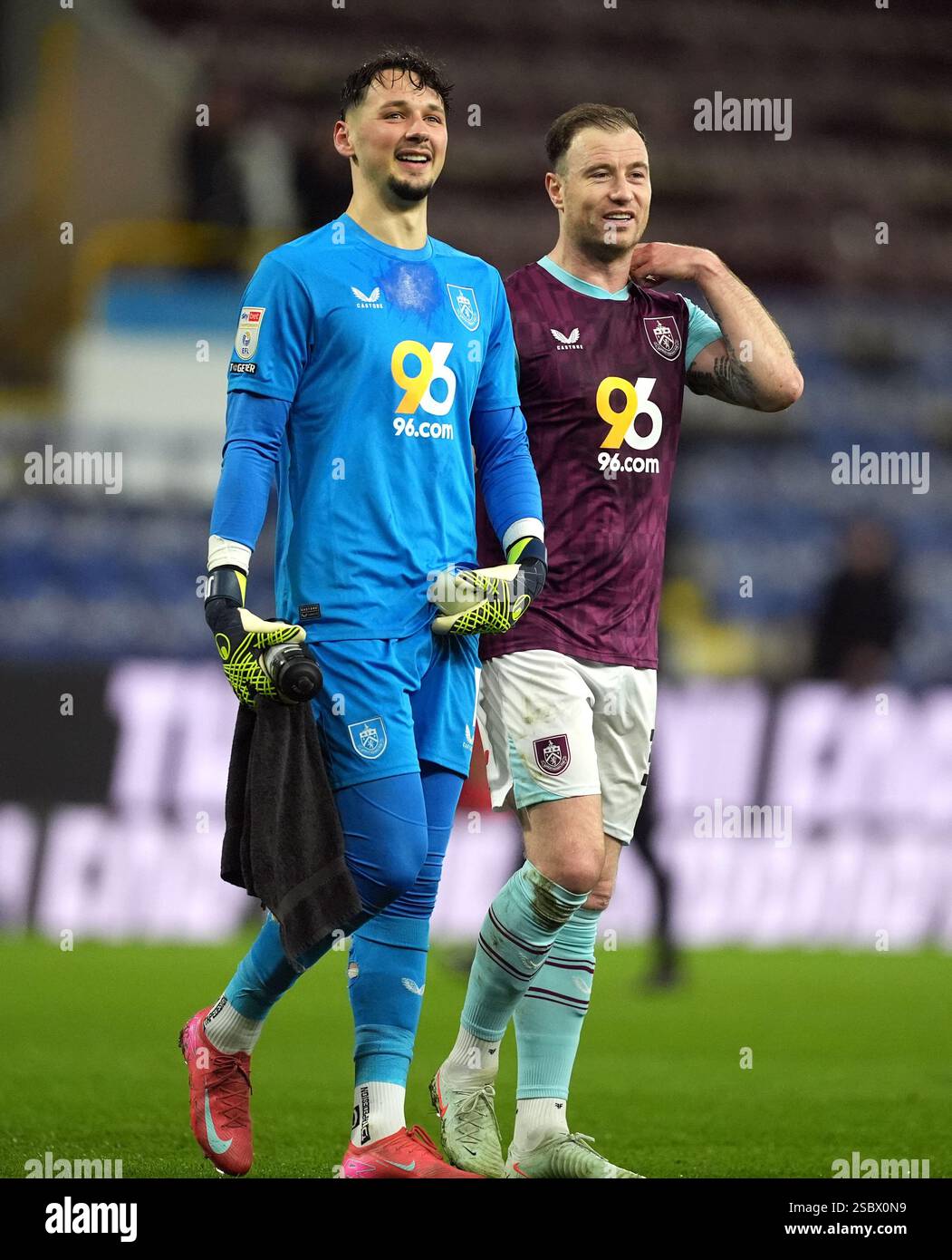 Burnley goalkeeper James Trafford and Ashley Barnes react following the ...