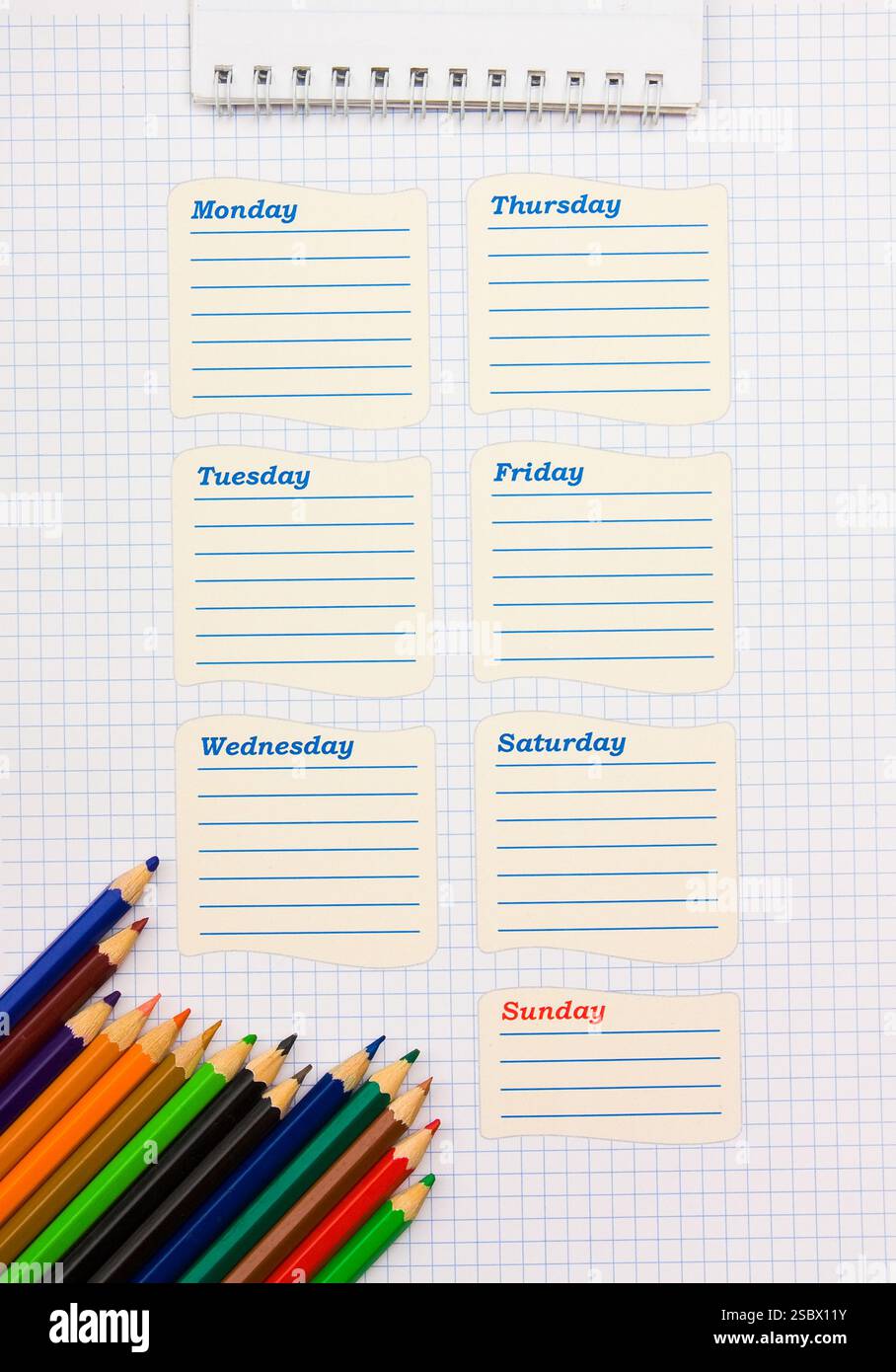 School diary for each day of the week with stationery Stock Photo - Alamy