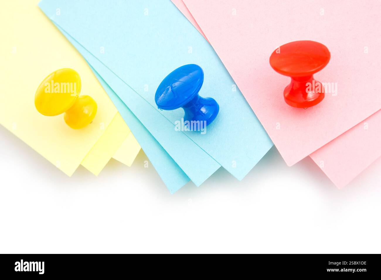 sheets pinned buttons isolated on white background Stock Photo - Alamy