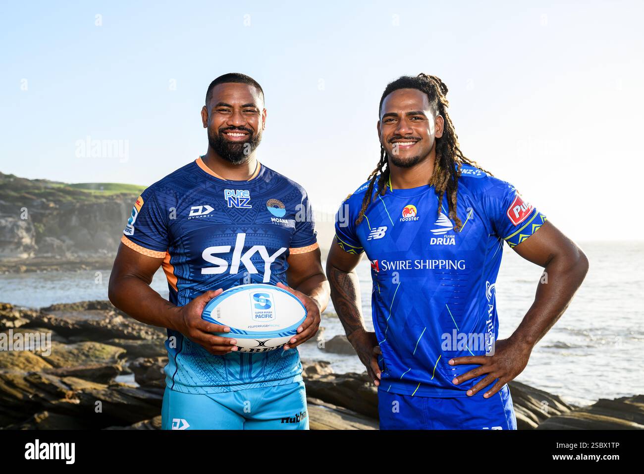 Super rugby players Julian Savea of Moana Pasifika (left), and Selestino Ravutaumada of Fijian ...